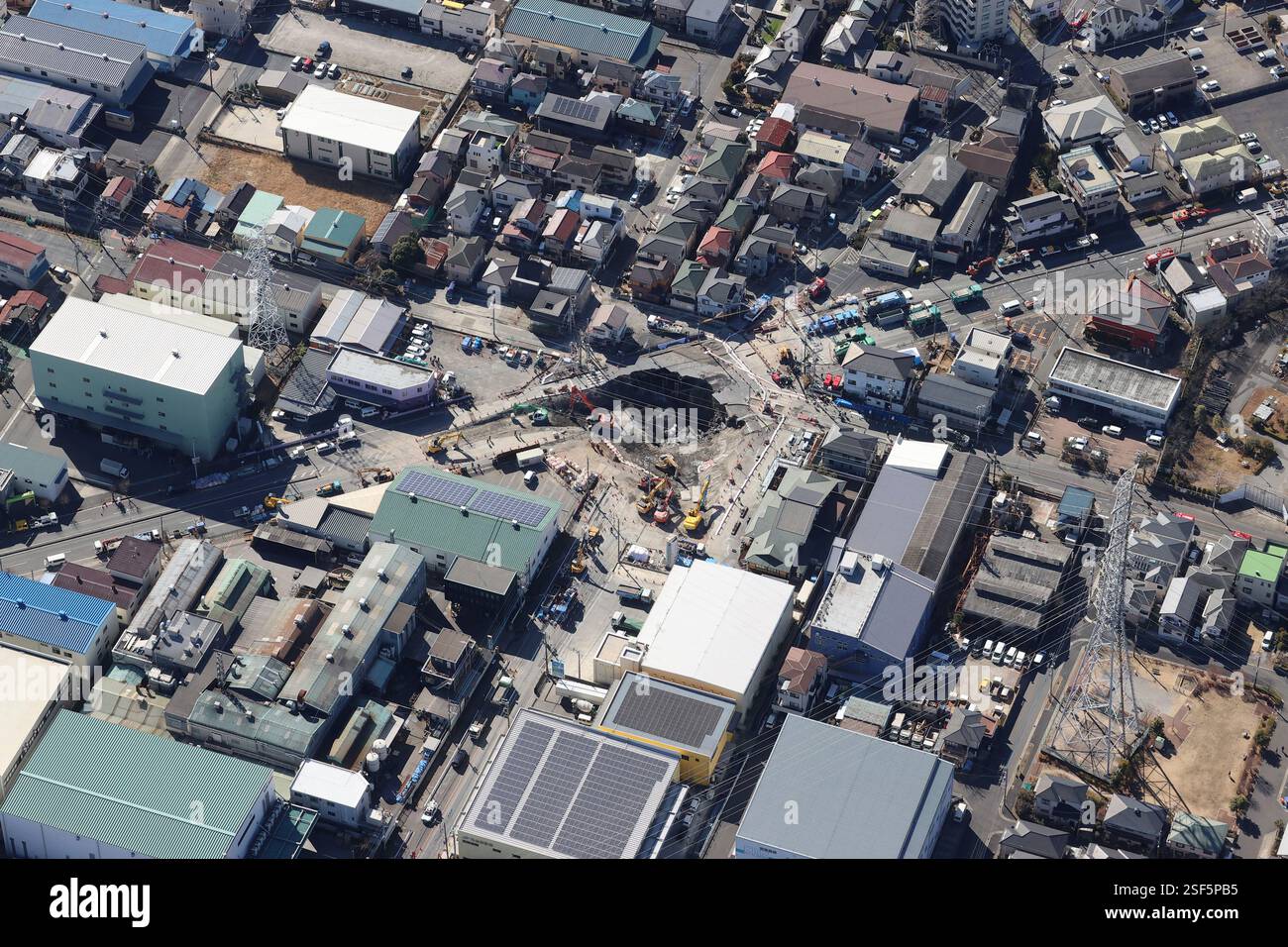 An aerial photo shows the collapsed site of a prefectural road waiting ...