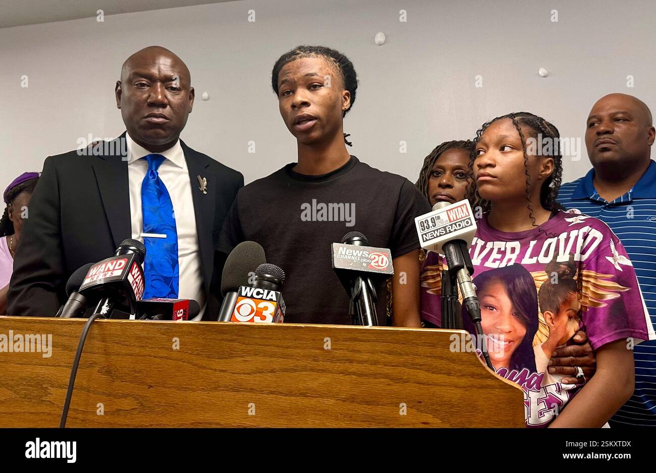 FILE - Malachi Hill Massey, 17, center, speaks at a news conference on ...