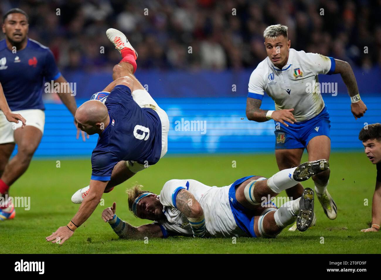 France's Maxime Lucu is tackled by Italy's Niccolo Cannone during the ...