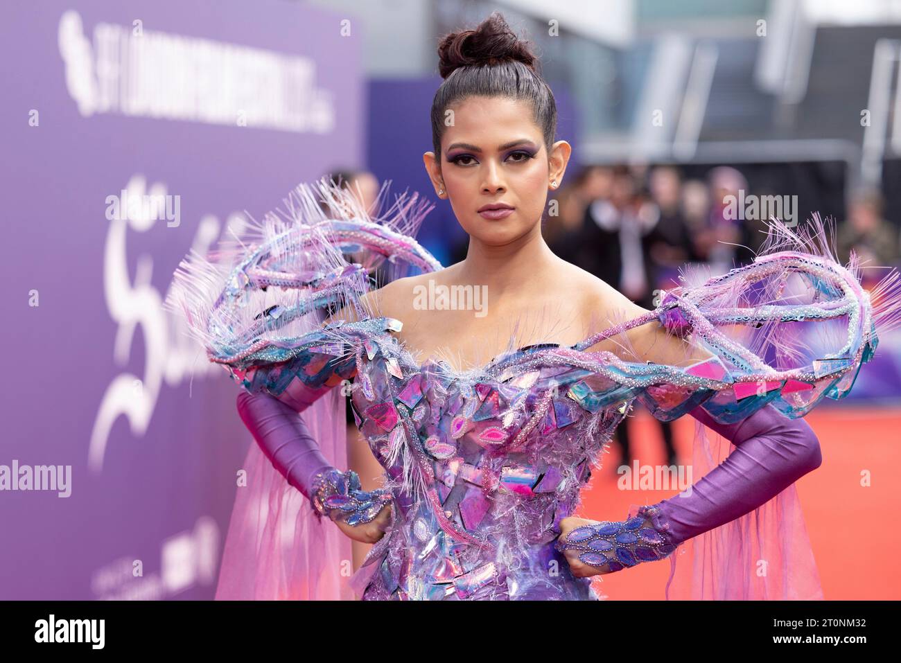Maksuda Akhter poses for photographers upon arrival for the premiere of ...