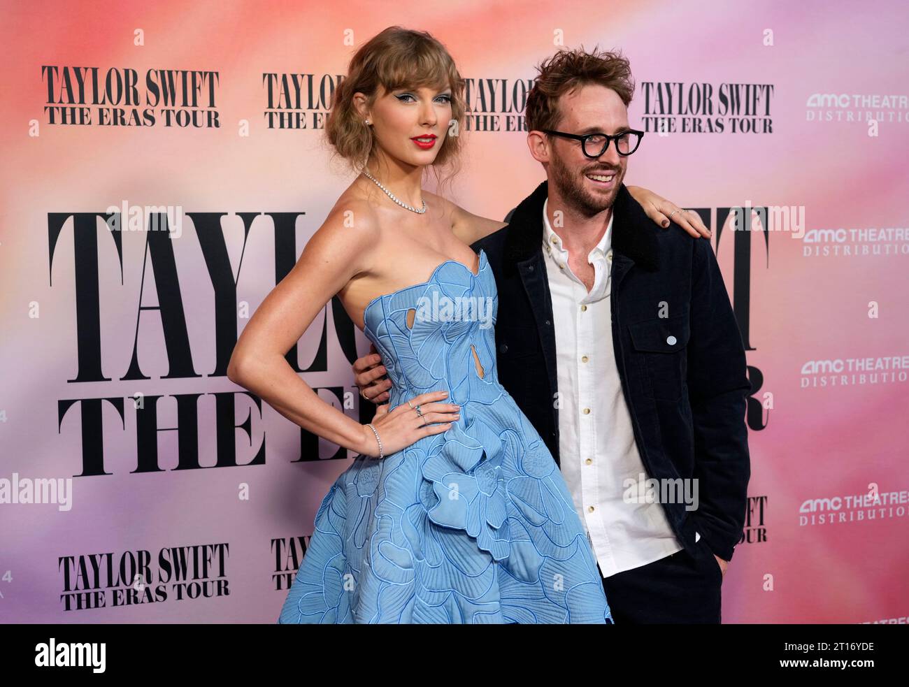 Taylor Swift, left, and director Sam Wrench arrive at the world ...