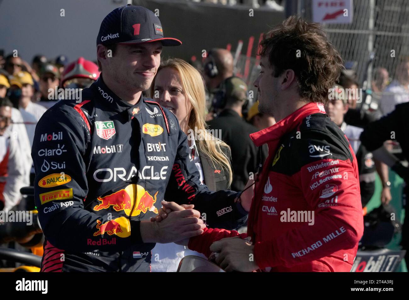 Race winner Red Bulls Max Verstappen, of Netherlands, left, shakes ...