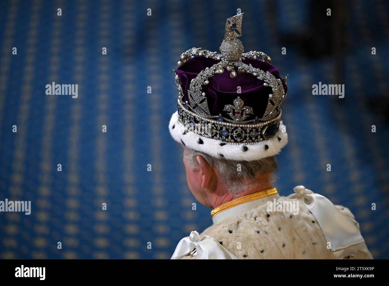 Britain's King Charles III, wearing the Imperial State Crown and the ...