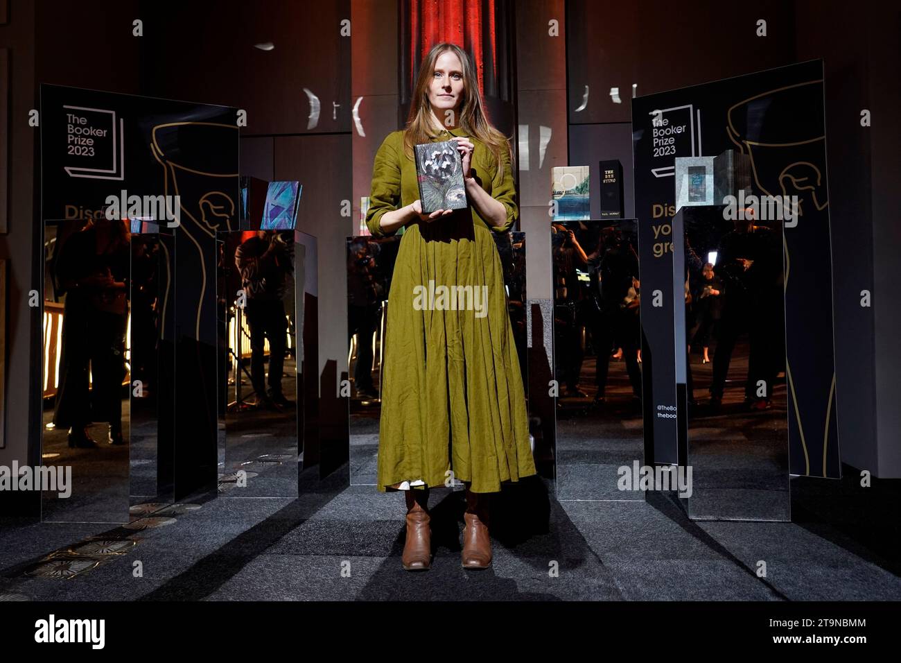 Sarah Bernstein poses with her book as she arrives at the Booker Prize ...