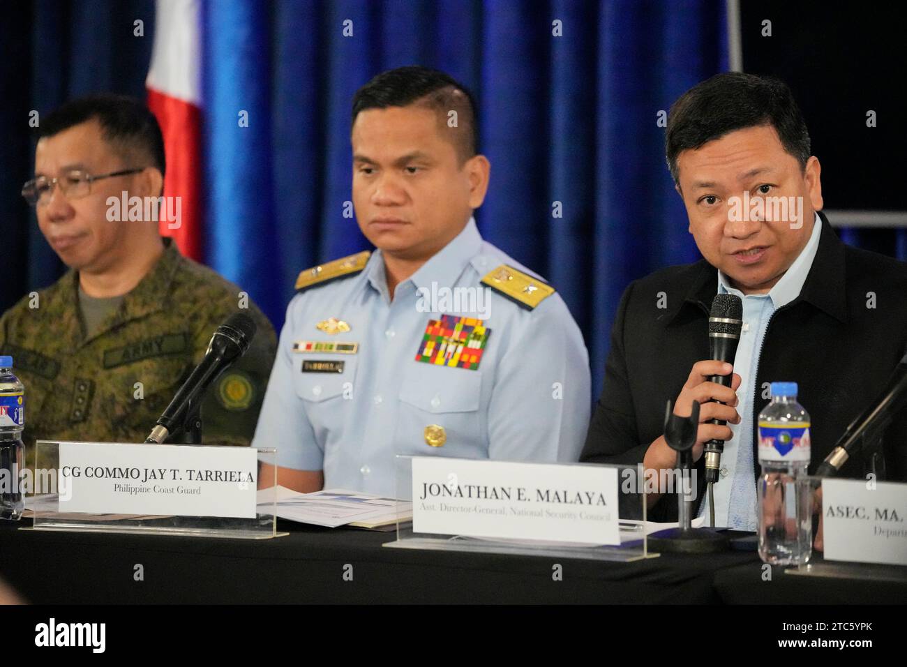 National Security Council spokesperson Jonathan Malaya, right, speaks ...
