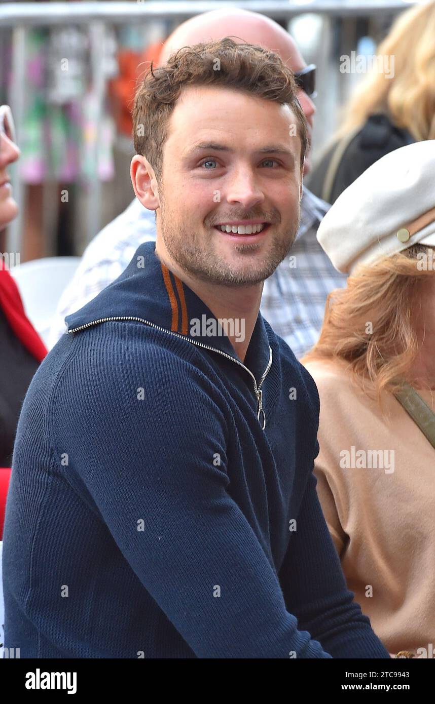 Dylan Efron attends a ceremony honoring Zac Efron with a star on the ...