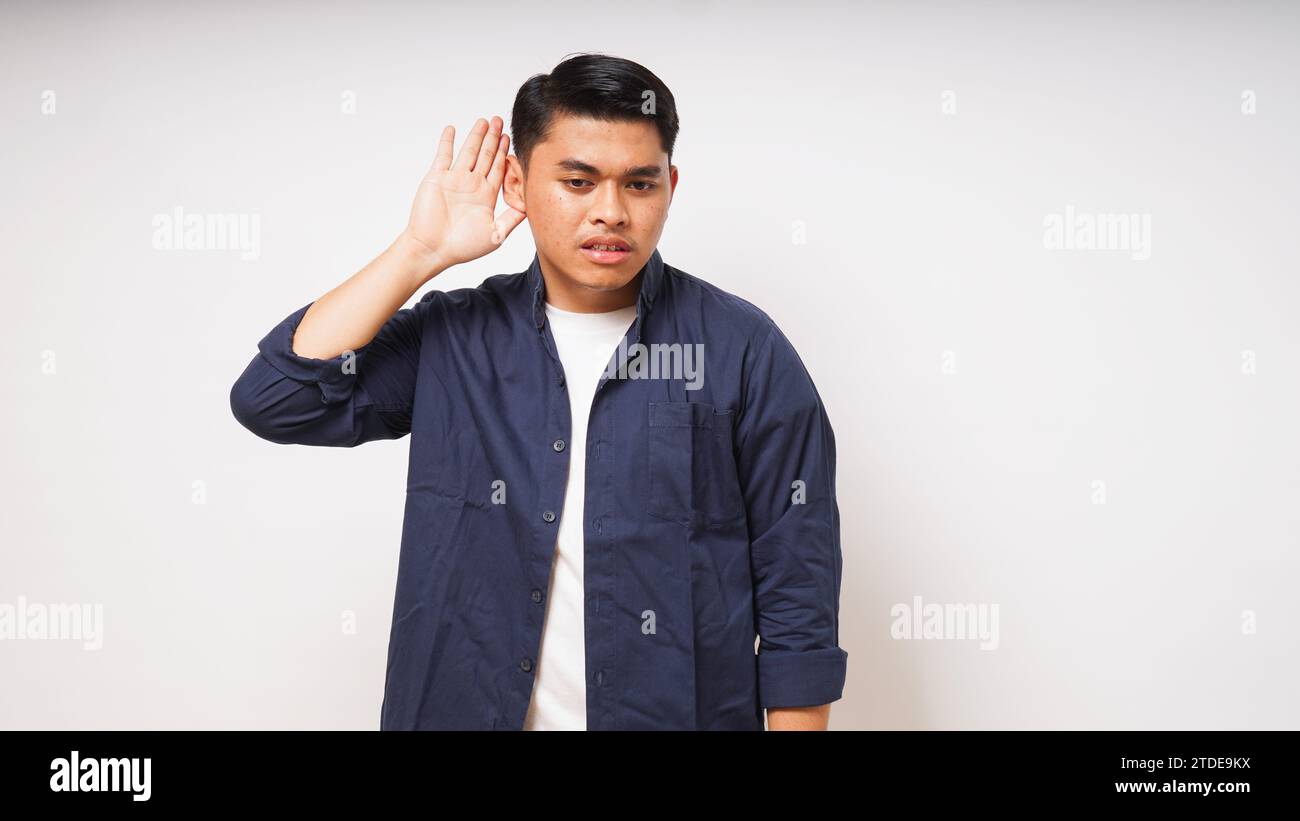 Der asiatische Mann benutzt die Gebärdensprache mit der Hand. Lernen ... Der asiatische Mann benutzt die Gebärdensprache mit der Hand. Lernen ...