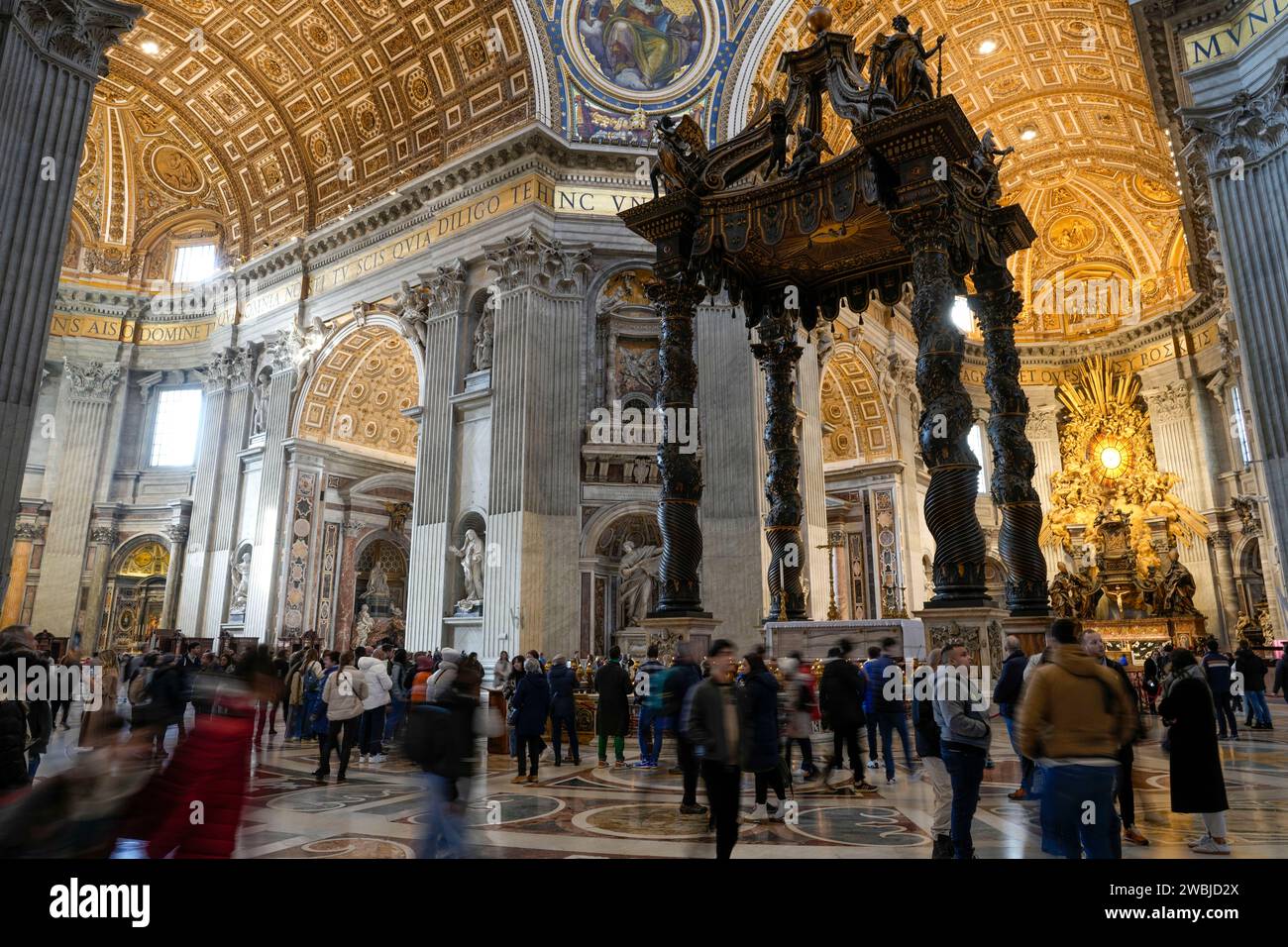 Visitors walk by the 17th century, 95ft-tall bronze canopy by Giovan ...