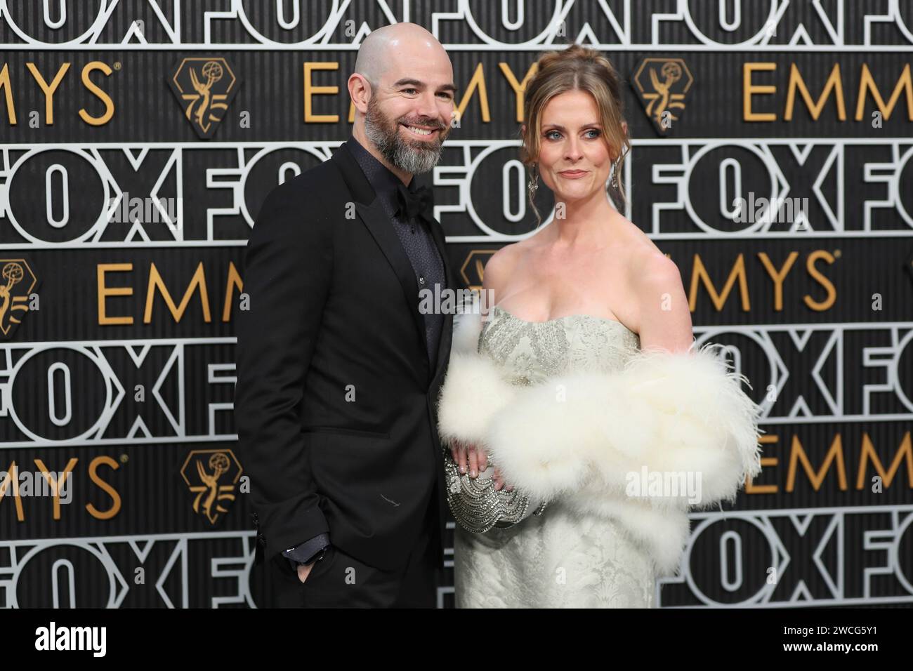 Kip Kroeger, left, and Tara Kroeger pose for a Red Carpet portrait at ...