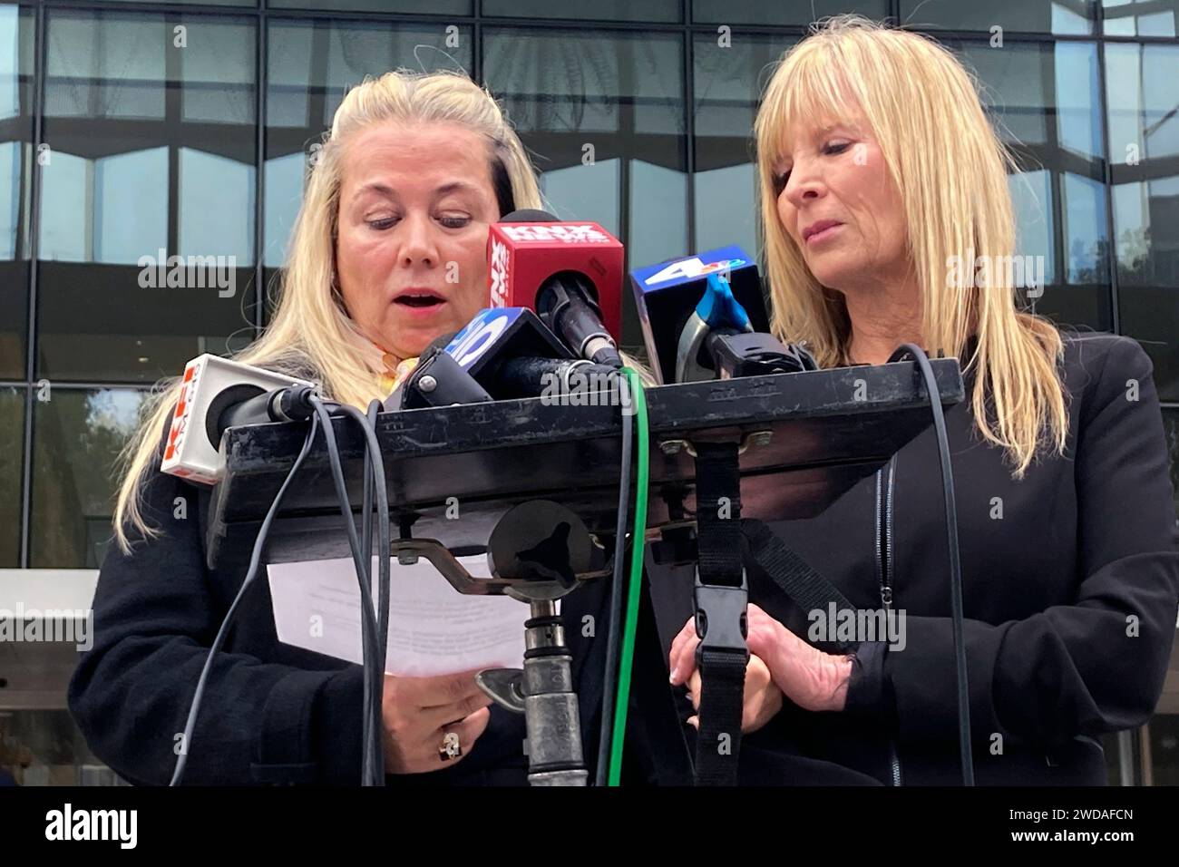 Eva Boni, left, thanks investigators on Friday, Jan. 19, 2024 in Los ...
