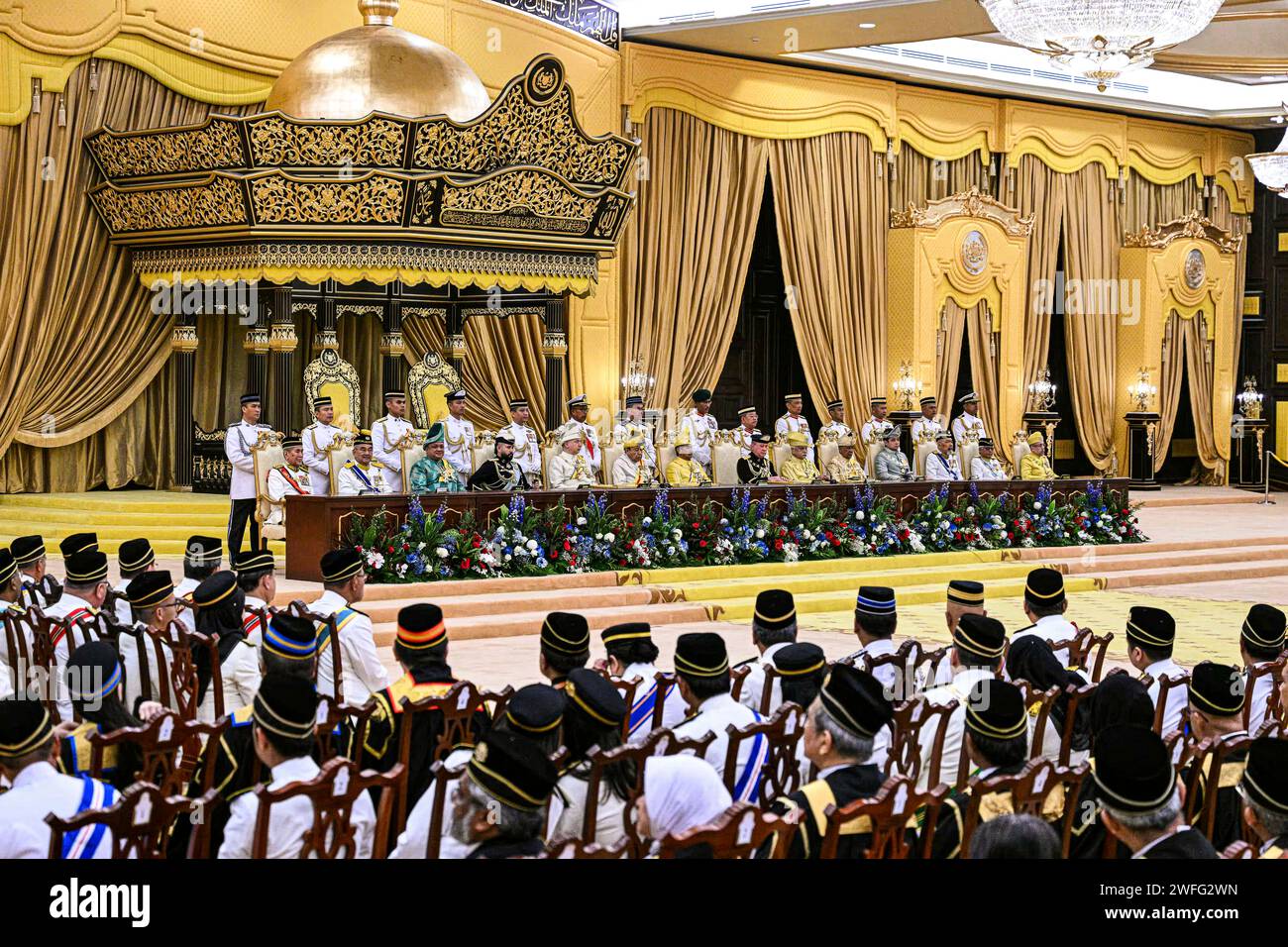 Sultan of Johor, Sultan Ibrahim Iskandar, center, sits during the oath ...