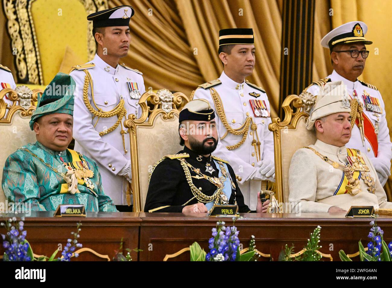 Crown Prince Ismail Sultan Ibrahim of Johor, center, attends the oath taking ceremony for the ...