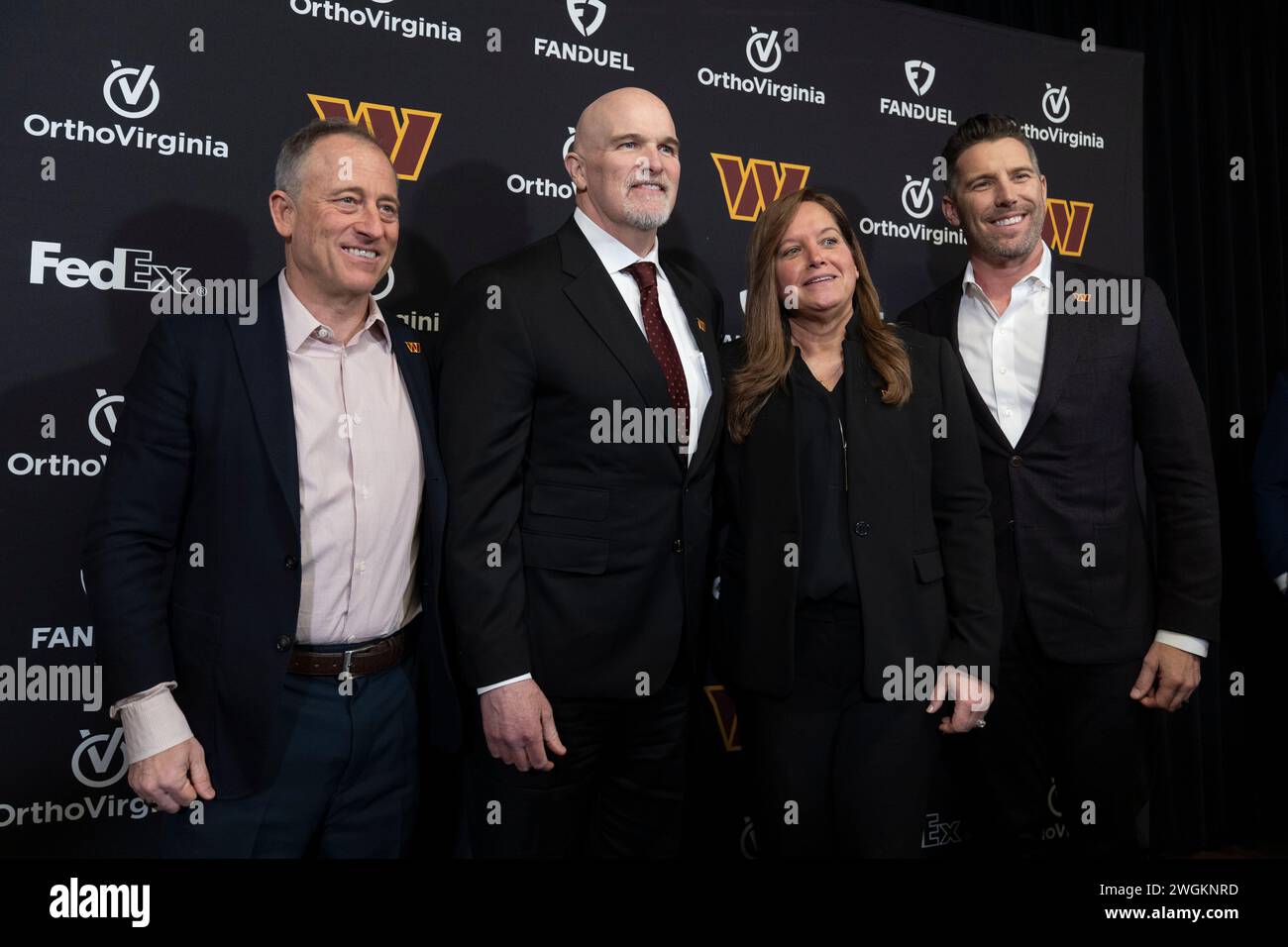 Washington Commanders new head coach Dan Quinn, second from left, and ...