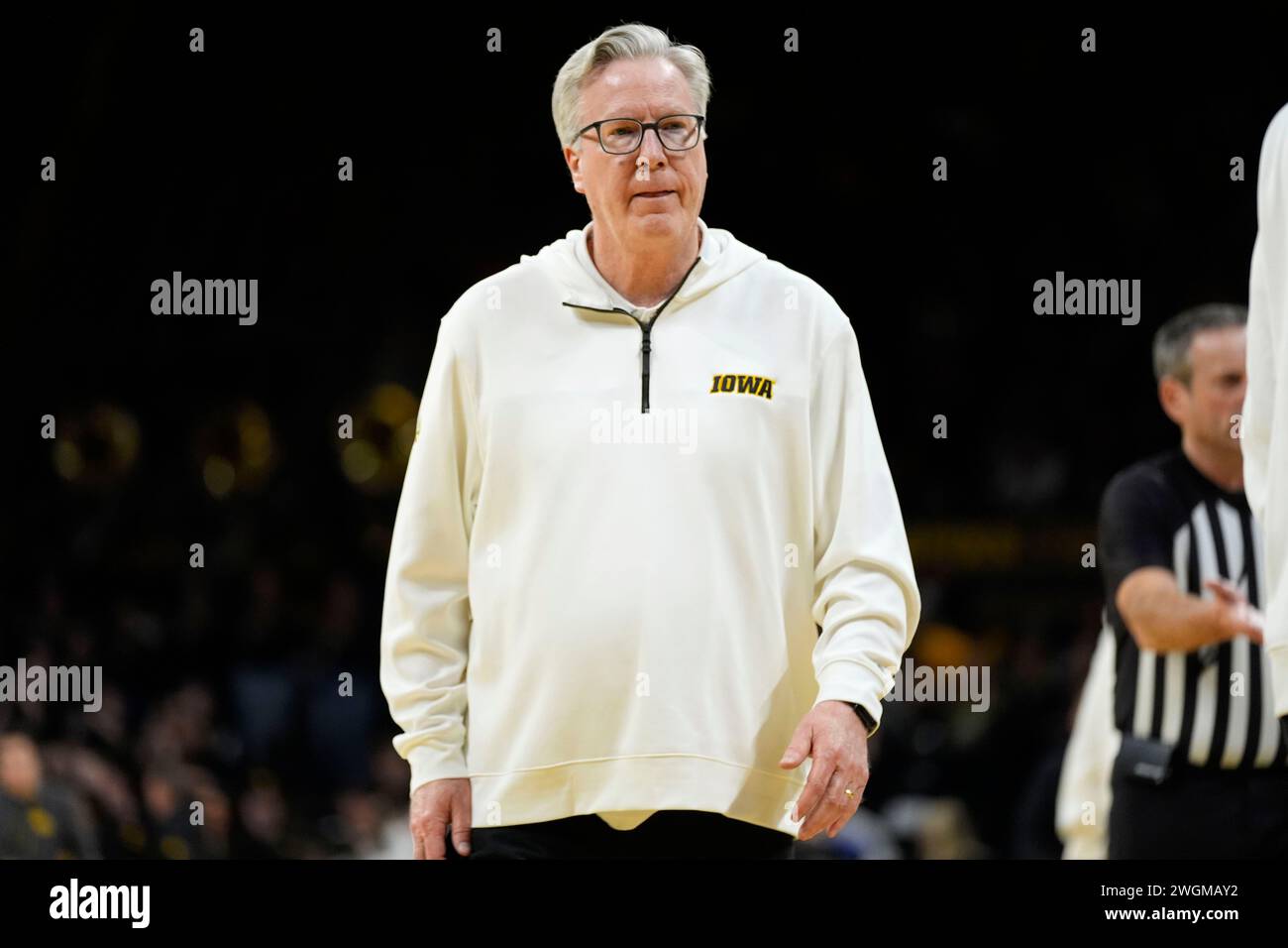 Iowa head coach Fran McCaffery walks on the court during the first half ...