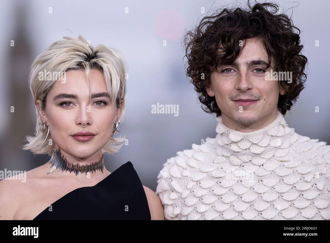 Florence Pugh and Timothee Chalamet pose for photographers at the photo call for the film 'Dune ...