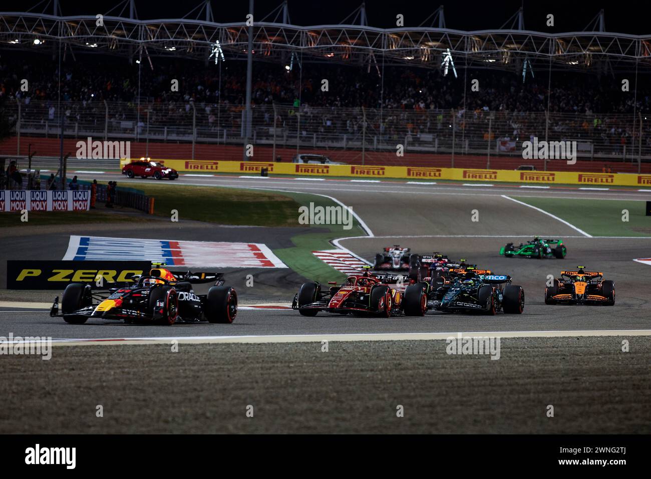 11 PEREZ Sergio (mex), Red Bull Racing RB20, Action 55 SAINZ Carlos (Spa), Scuderia Ferrari SF ...