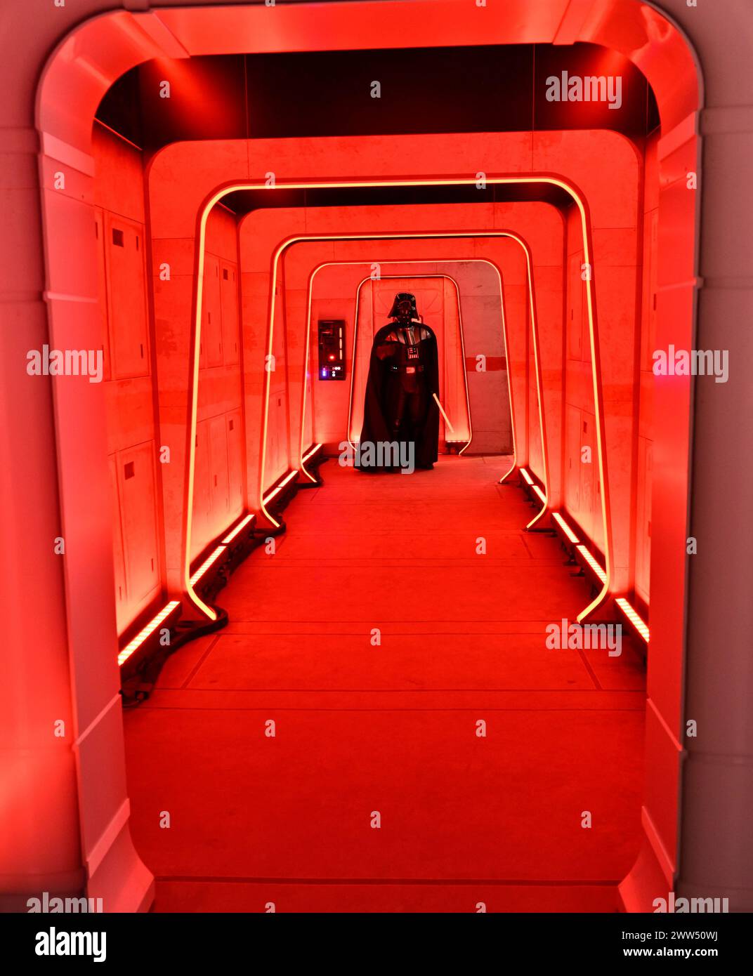 A Darth Vader costumed character poses at the Hasbro and Amazon Star ...