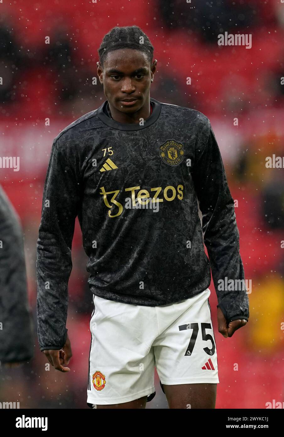 Habeeb Ogunneye von Manchester United bereitet sich vor dem Spiel der Premier League in Old ...
