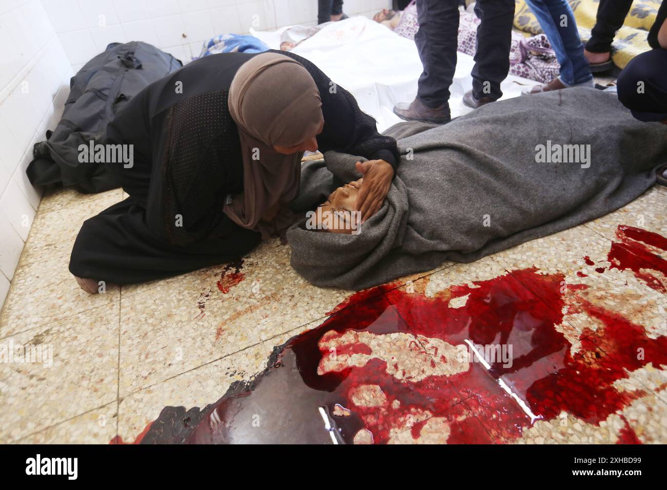 Leichen der Palästinenser, die ihr Leben verloren haben, nachdem der ...