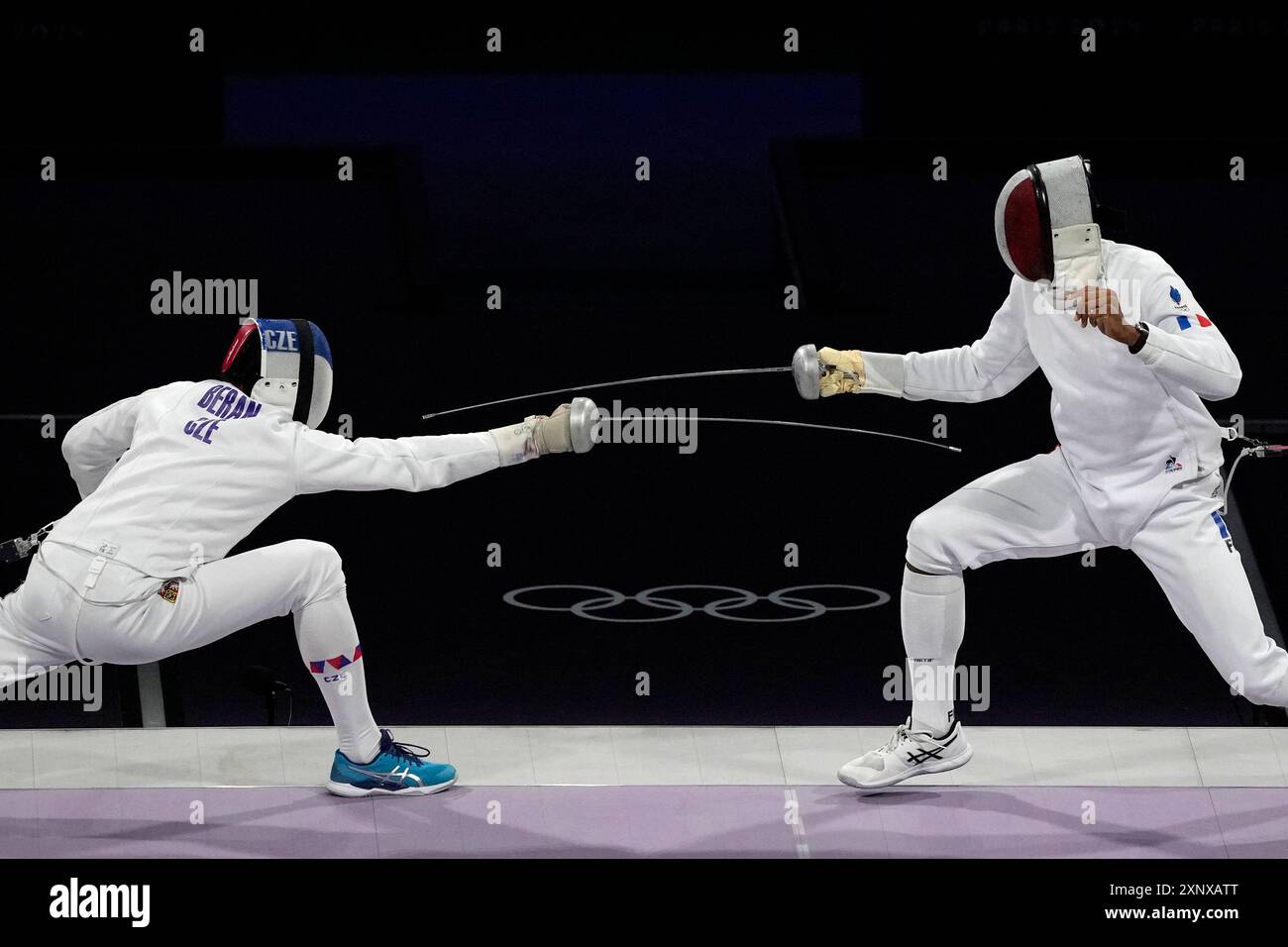 Czech Republic's Jiri Beran, left, competes with France's Yannik Borel ...