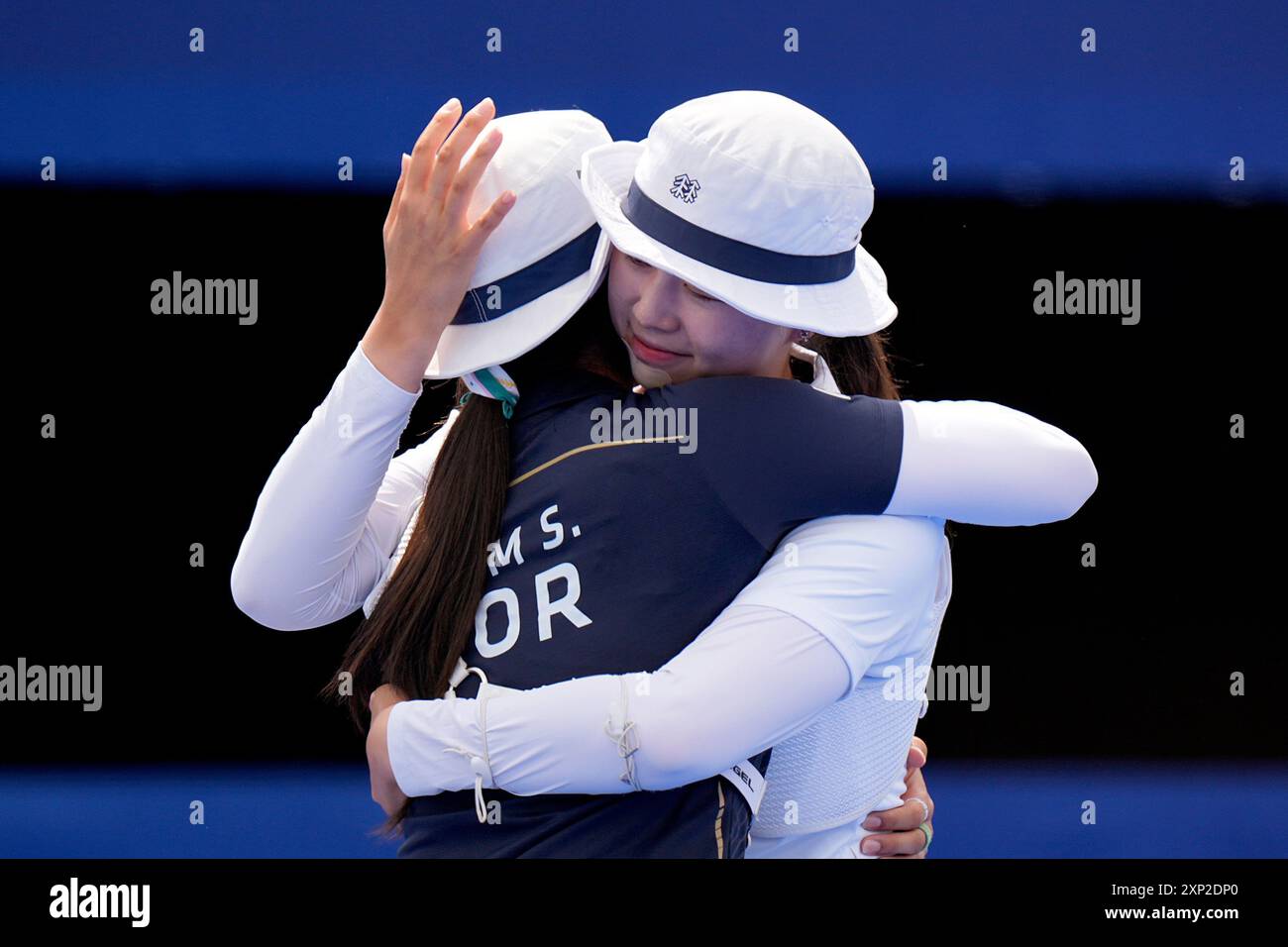 South Korea's Lim Si-hyeon, right, hugs teammate Nam Su-hyeon after Lim ...