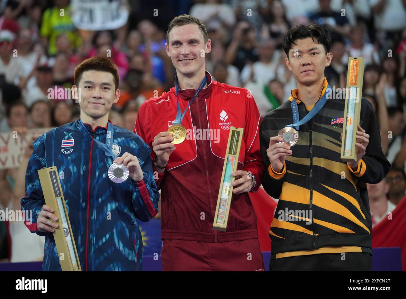 Medalists, from left, Thailand's Kunlavut Vitidsarn, silver, Denmark's Viktor Axelsen, gold, and ...