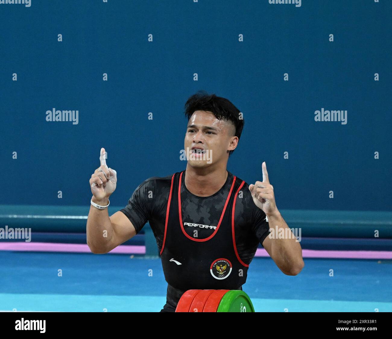 JUNIANSYAH Rizki of Indonesia reacts after winning the men's ...