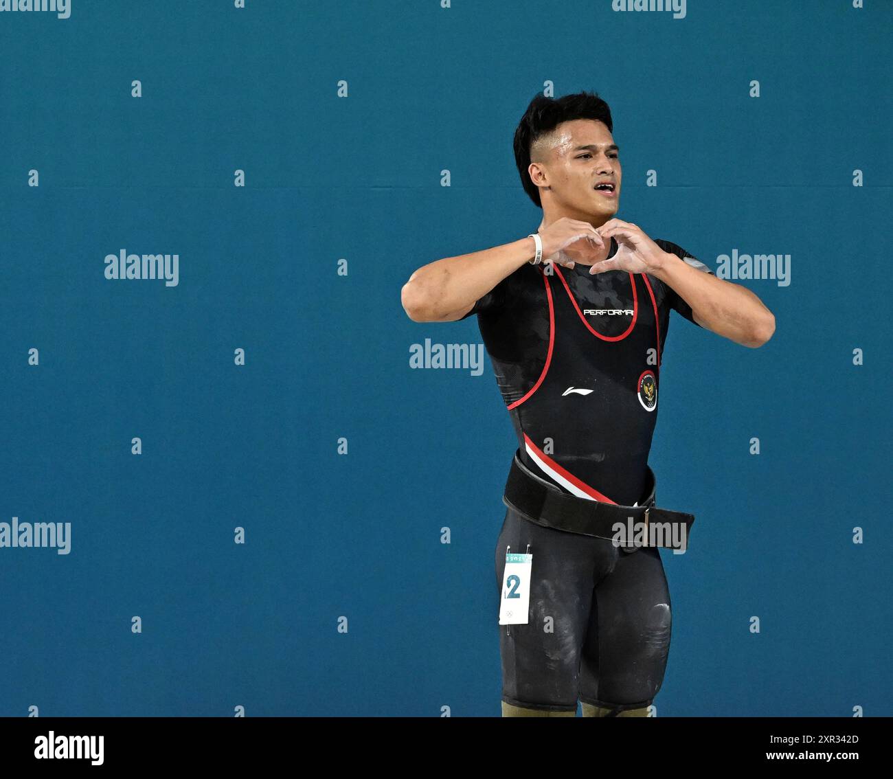 JUNIANSYAH Rizki of Indonesia reacts after winning the men's ...