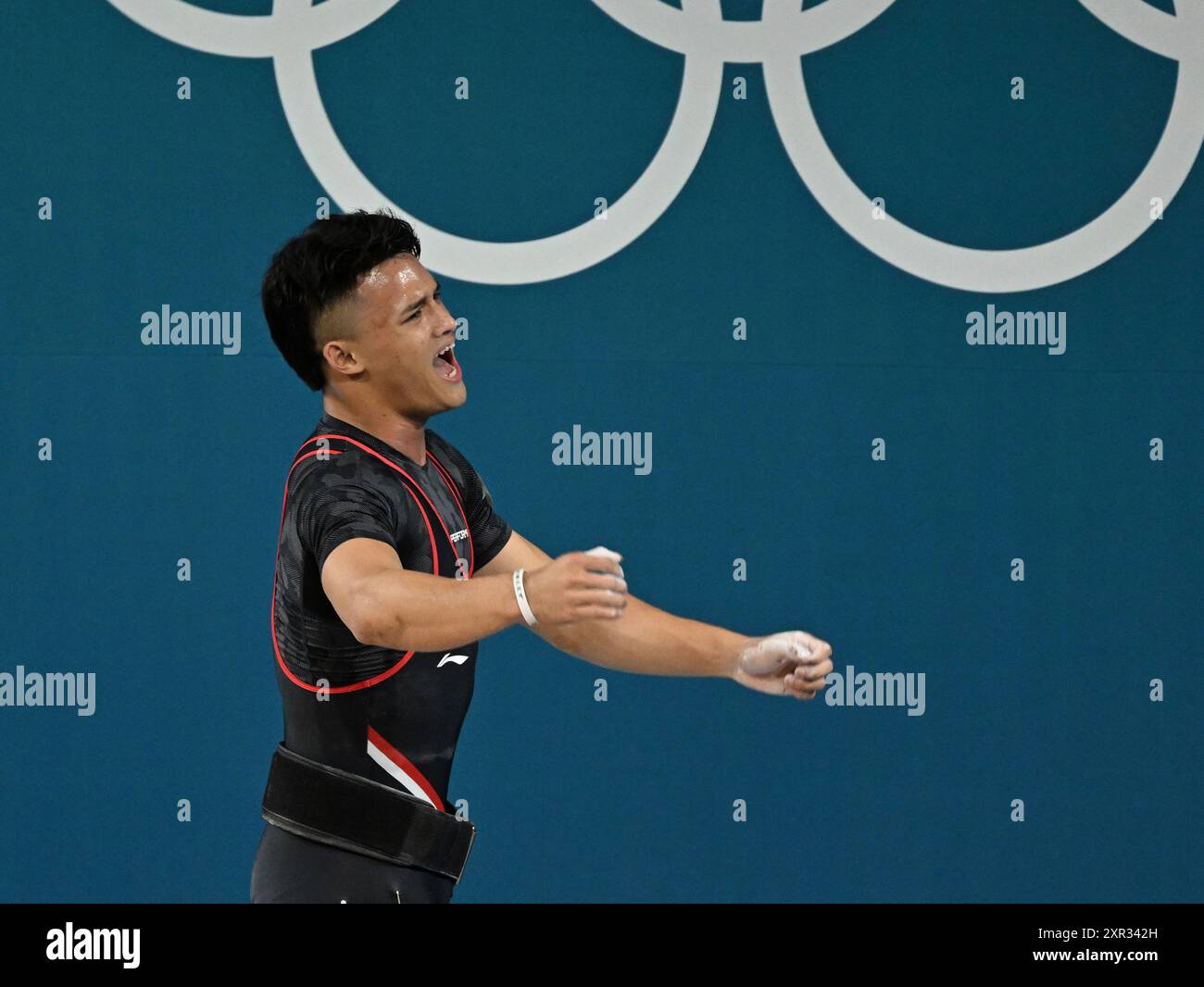 JUNIANSYAH Rizki of Indonesia reacts after winning the men's ...