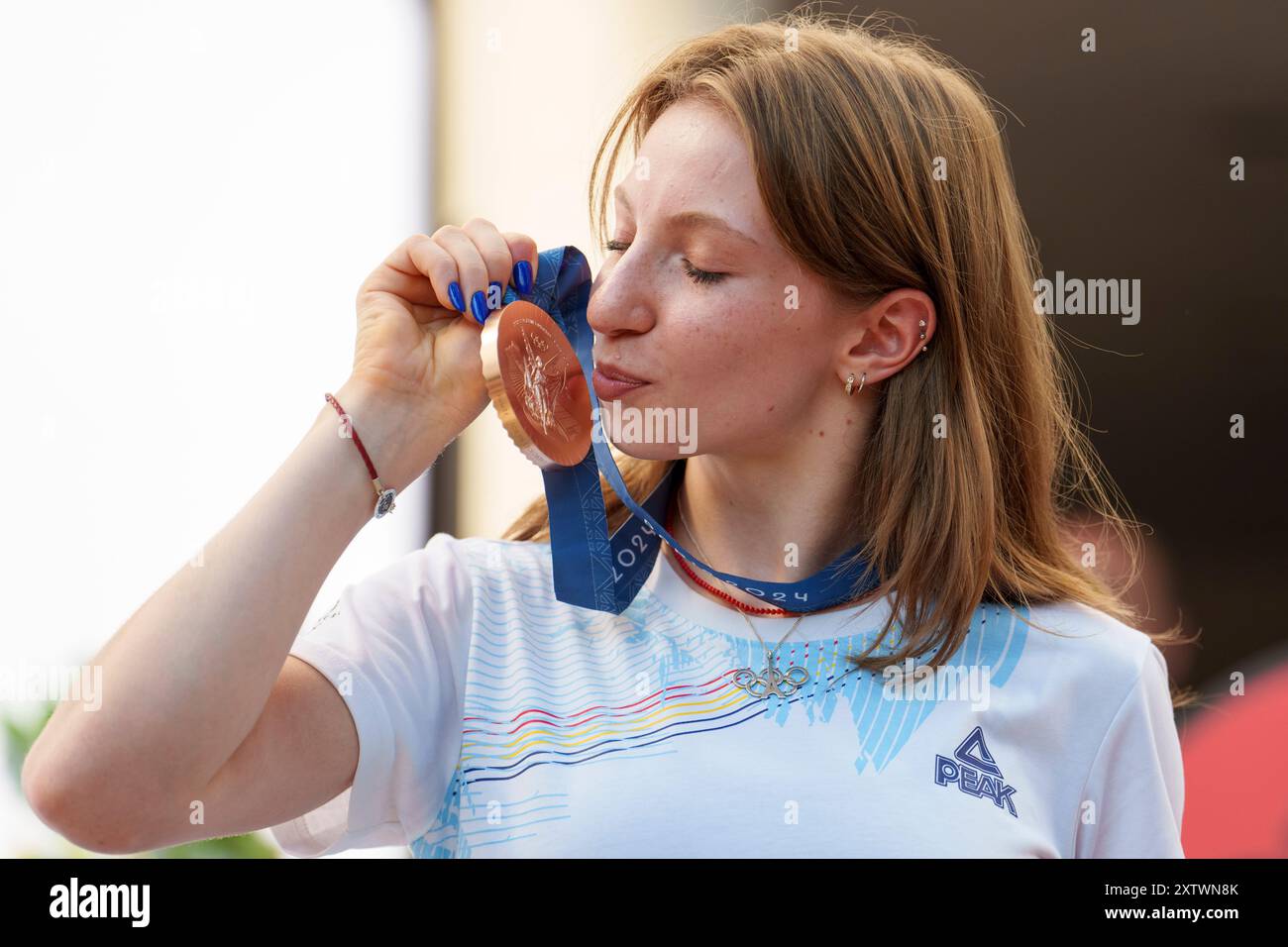 Romanian gymnast Ana Barbosu poses with the bronze medal for her women ...