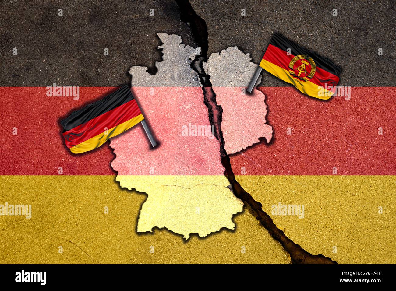26. September 2024: Symbolisches Bild der Teilung Deutschlands mit den Fahnen der Bundesrepublik ...