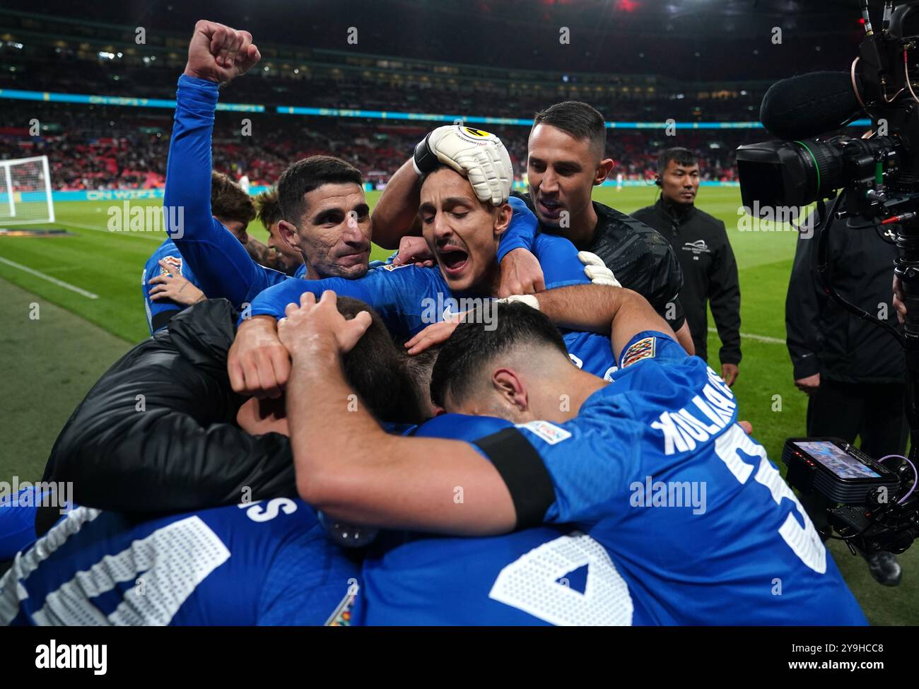 Die griechischen Spieler feiern, nachdem Evangelos Pavlidis (Hidden ...