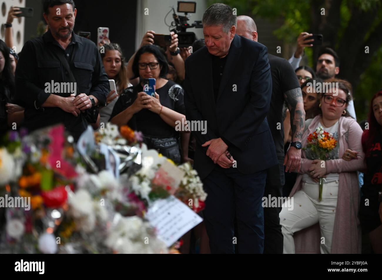 Geoff Payne, center, the father of former One Direction singer Liam ...