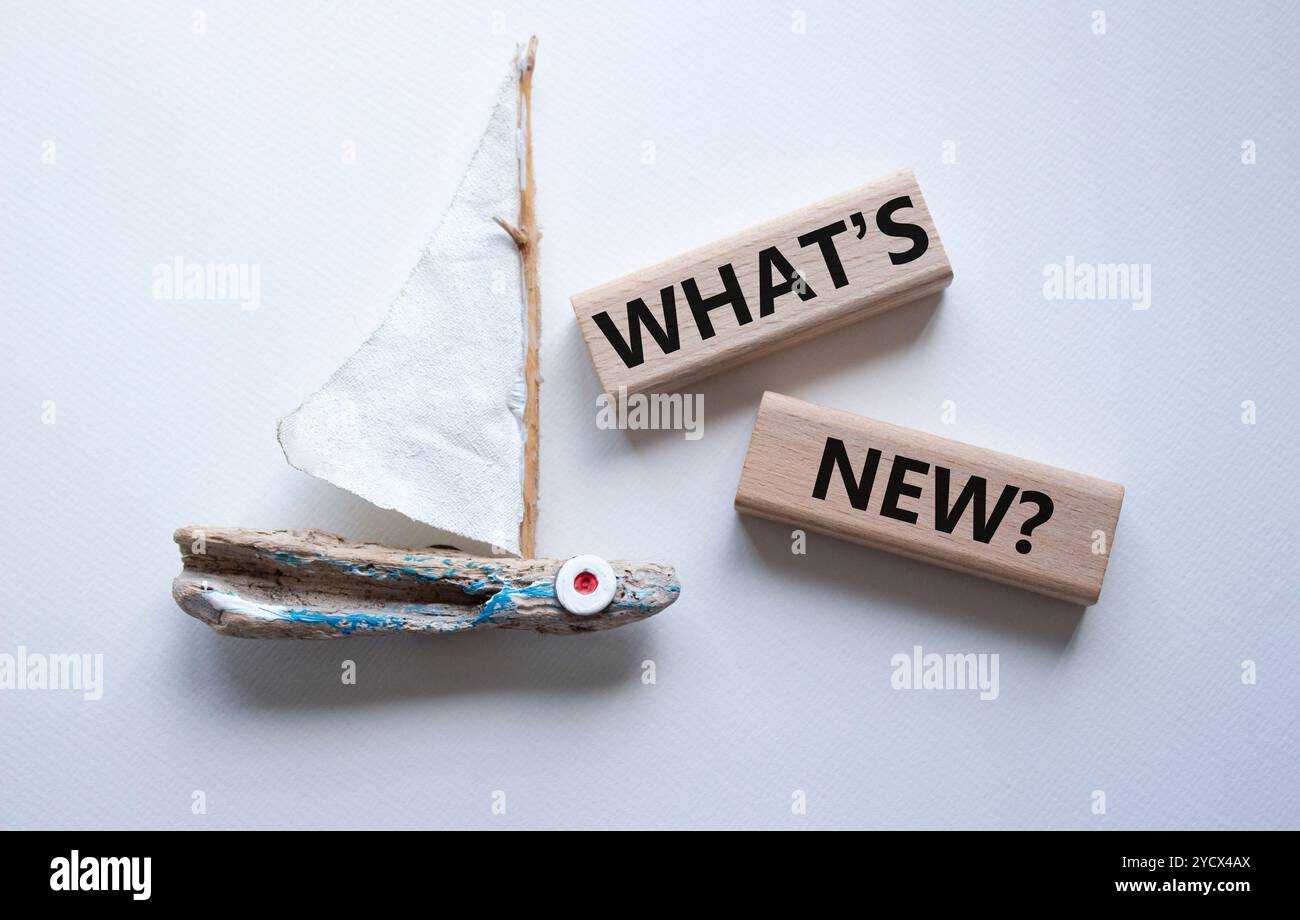 Symbol „Was ist neu“. Konzeptwort Was ist neu bei Holzblöcken? Schöner ...