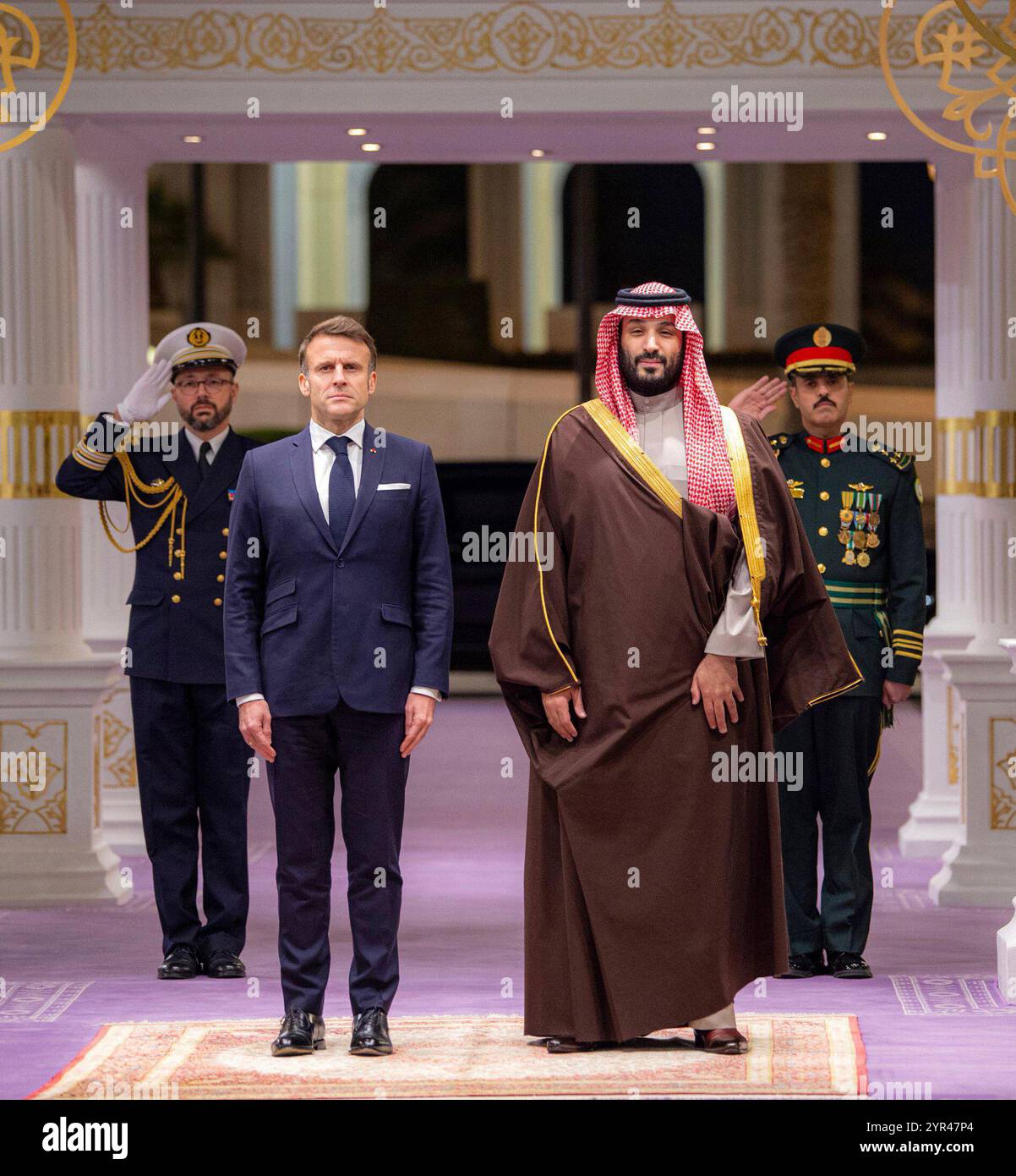 In this photo provided by the Saudi Royal Palace, French President ...