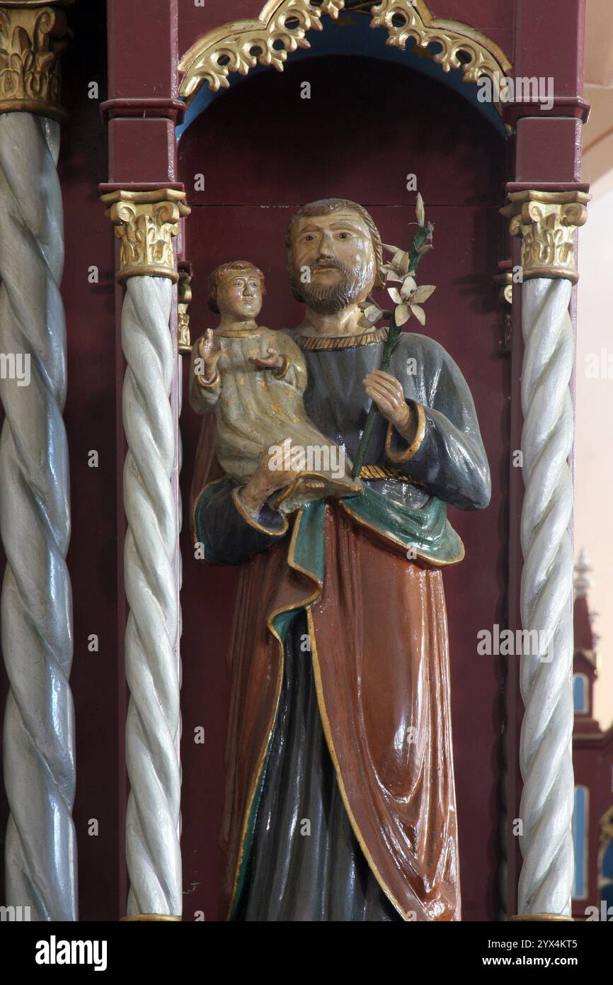 Der heilige Joseph mit dem Jesuskind, Statue auf dem Altar der heiligen Barbara in der ...