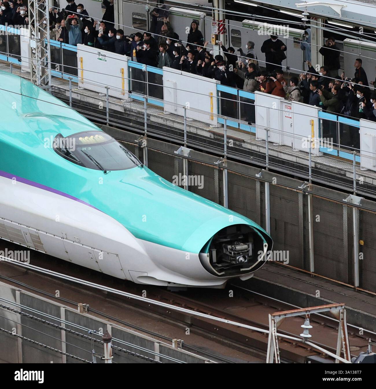 A photo shows "Hayabusa" of the Tohoku Shinkansen (bullet train) moving with its coupling ...