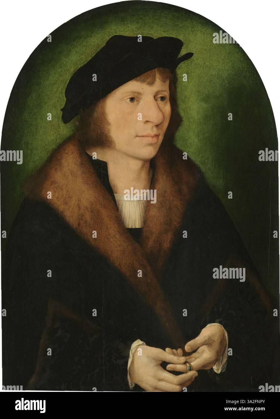 Dieses halblange Porträt, das Joos van Cleve zugeschrieben wird, zeigt einen jungen Mann, der ...