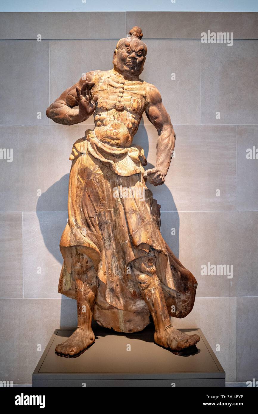 Always on Guard Dramatically posed, this muscular figure forms a pair ...