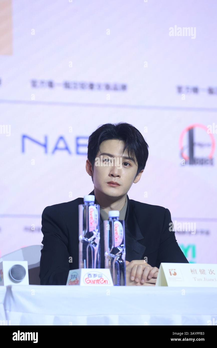 Chinese actor, singer, and dancer Tan Jianci attends an activity in ...
