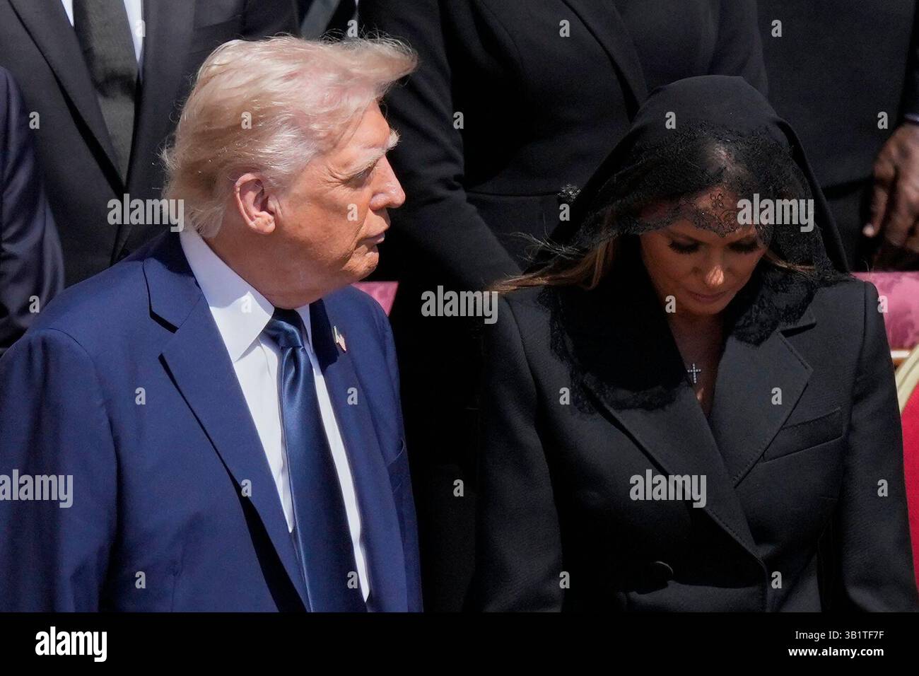 President Donald Trump and first lady Melania Trump attend the funeral ...