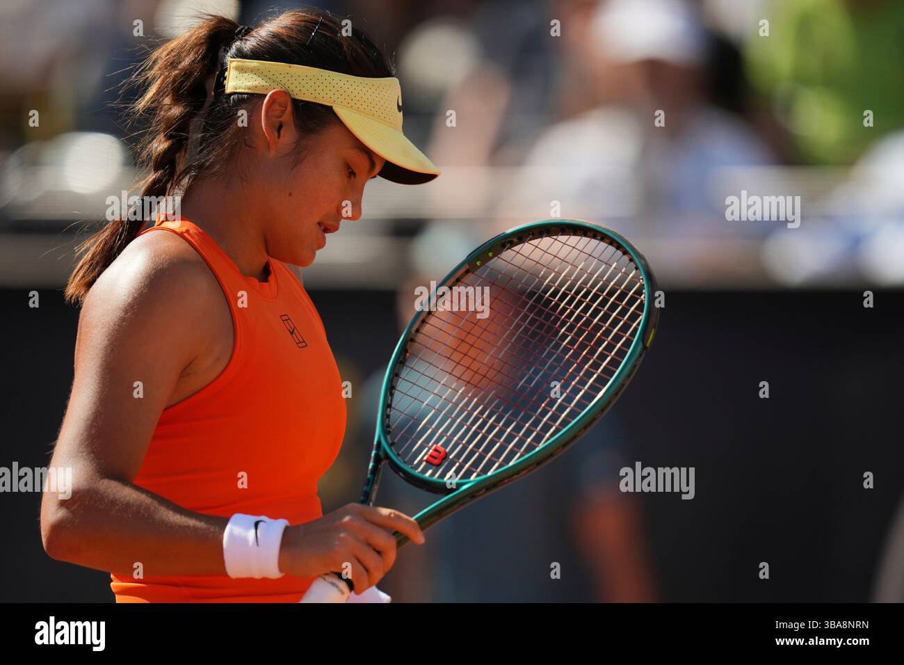 Britain's Emma Raducanu looks down as she plays United States' Coco ...