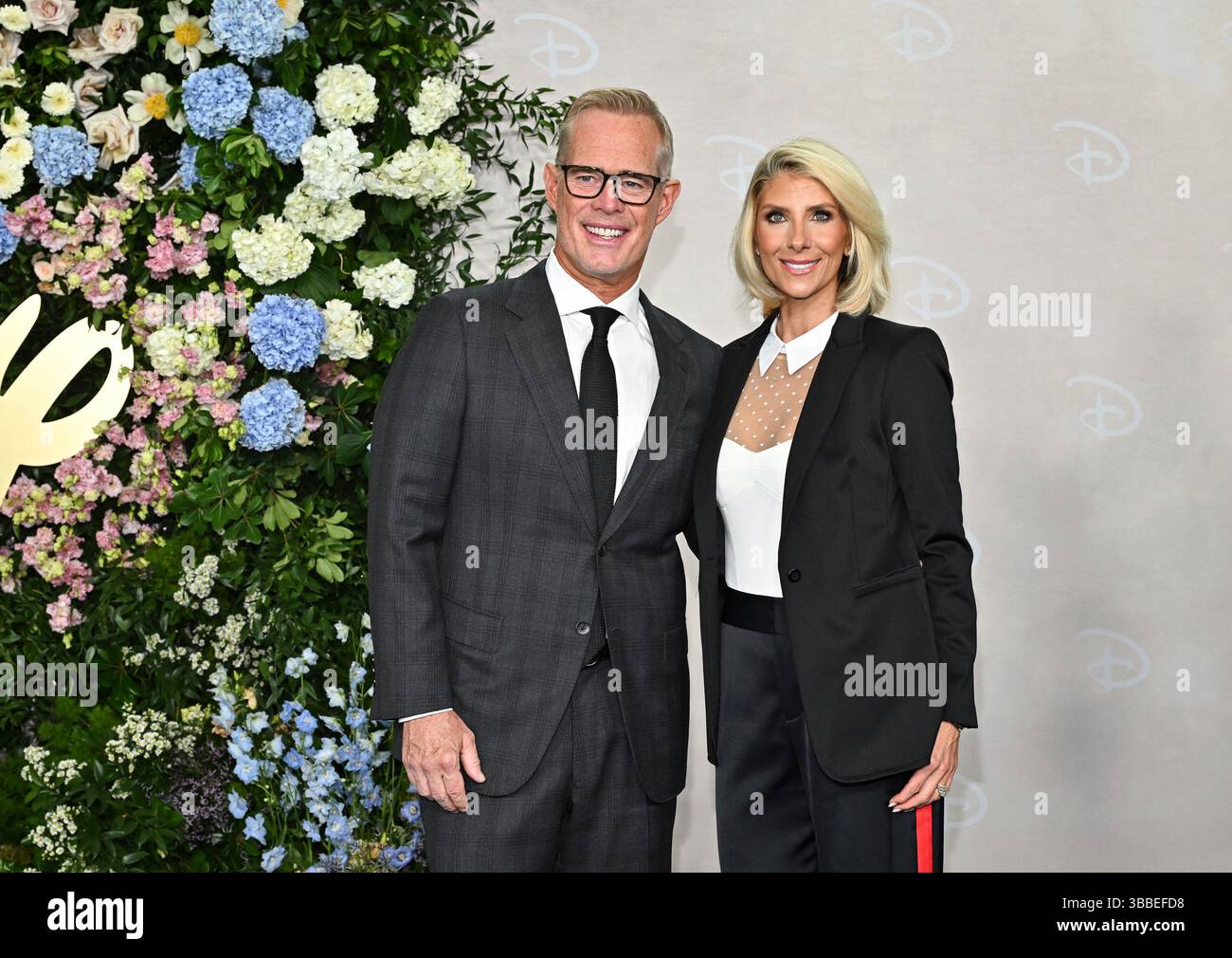 Joe Buck, left, and Michelle Beisner-Buck attend the Disney 2025 ...
