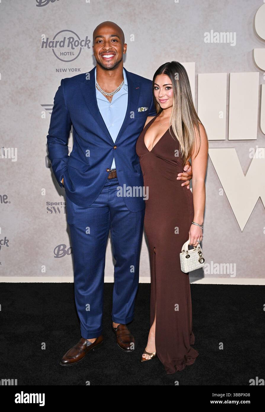 NFL player AJ Dillon, left, and wife Gabrielle Dillon attend the Sports ...