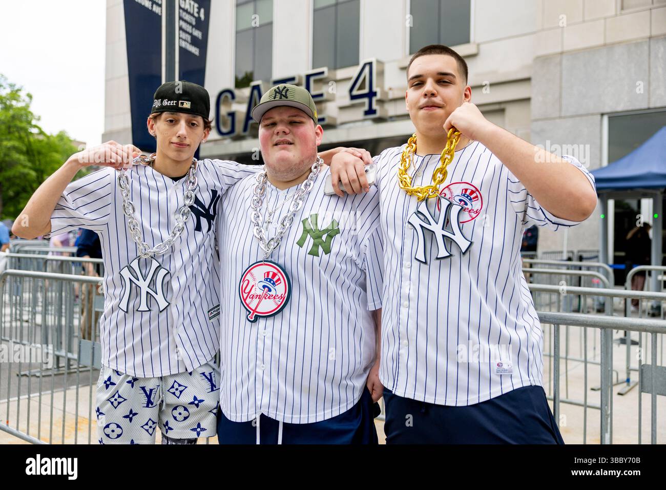 BRONX, NY - MAY 17: Local Yankees fans get ready to enter the stadium ...