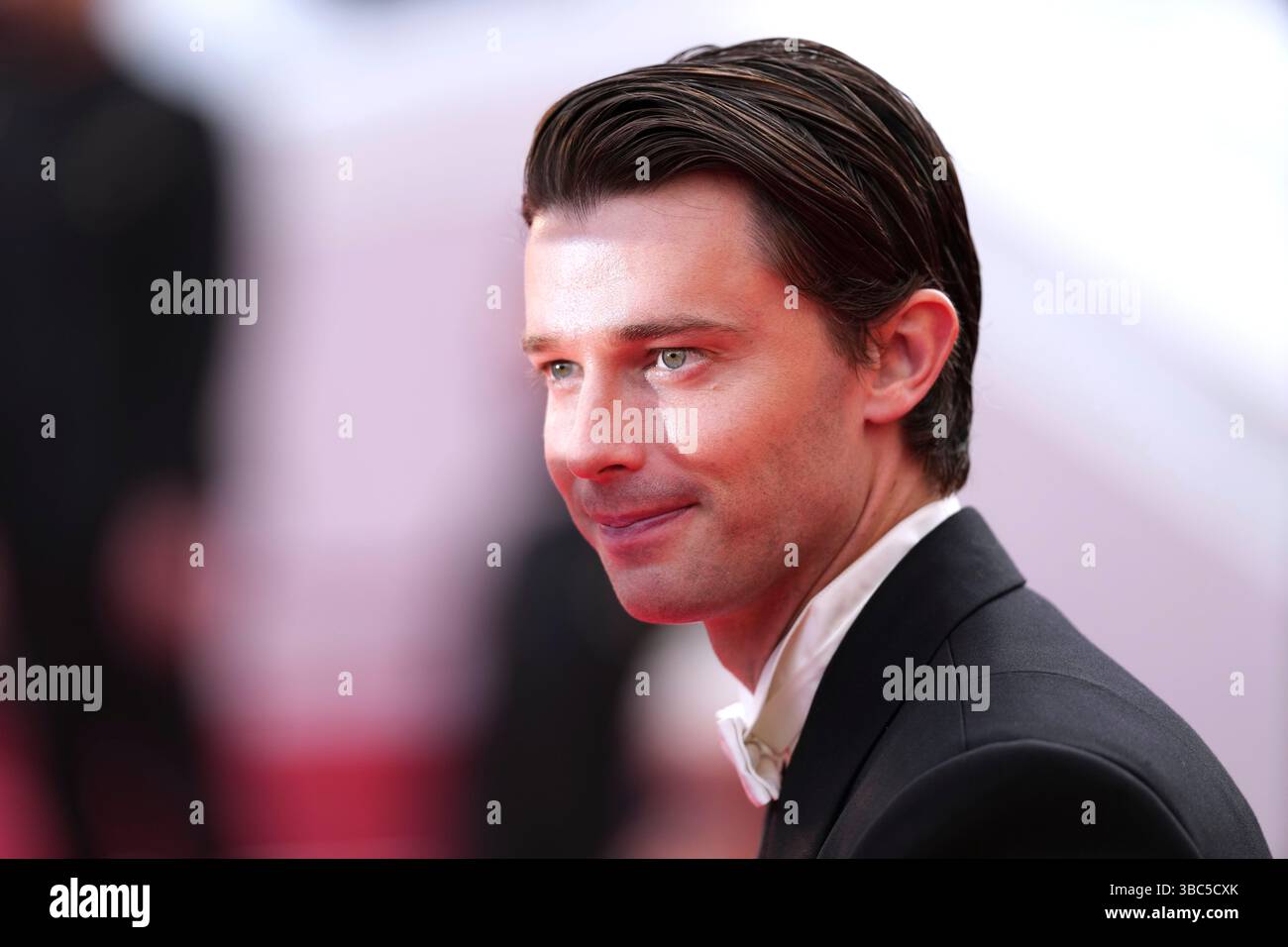 Patrick Schwarzenegger poses for photographers upon arrival at the ...