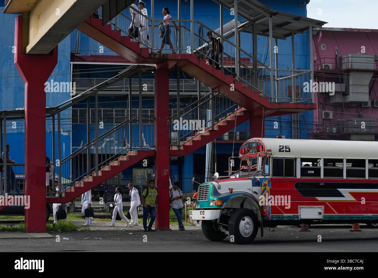 A Red Devil transport bus makes a stop in Colon, Panama, Friday, May 16 ...