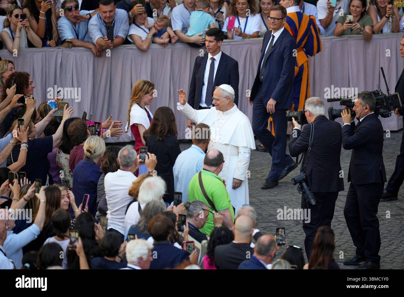 Pope Leo XIV arrives in the St. Damasus courtyard at the Vatican to meet with the participants ...