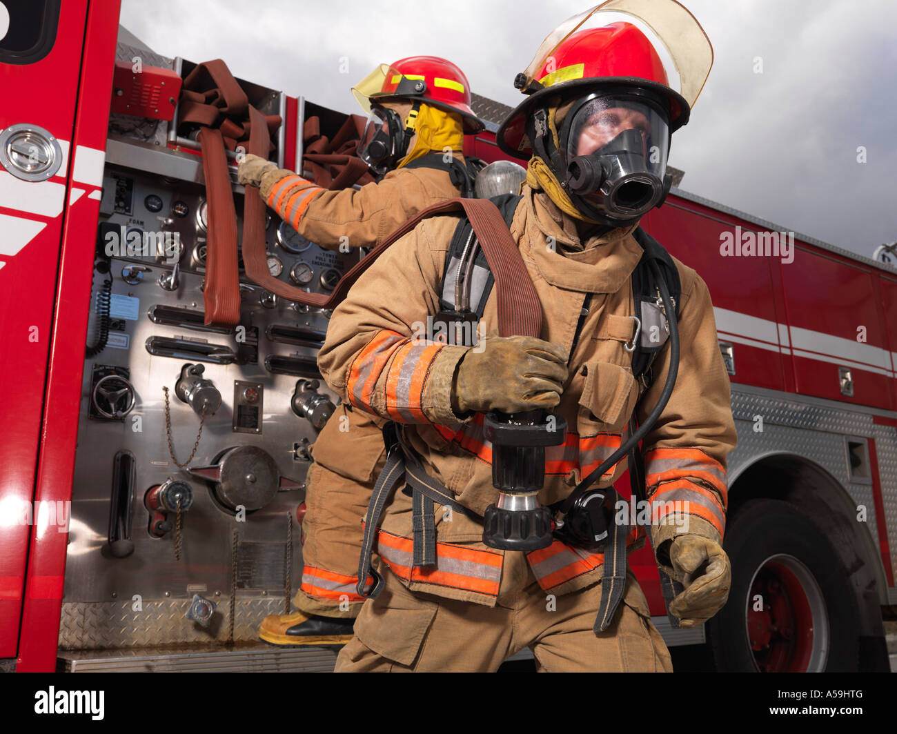 Feuerwehrschlauch Team Stockfotos und -bilder Kaufen - Alamy