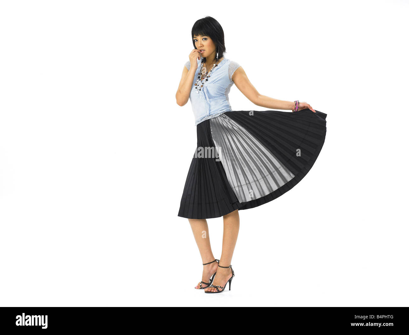 Frauen mit kurzen haaren und rock Ausgeschnittene Stockfotos und ...